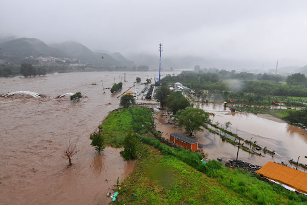 Beijing, northern China boost rescue efforts after worst storm in years ...