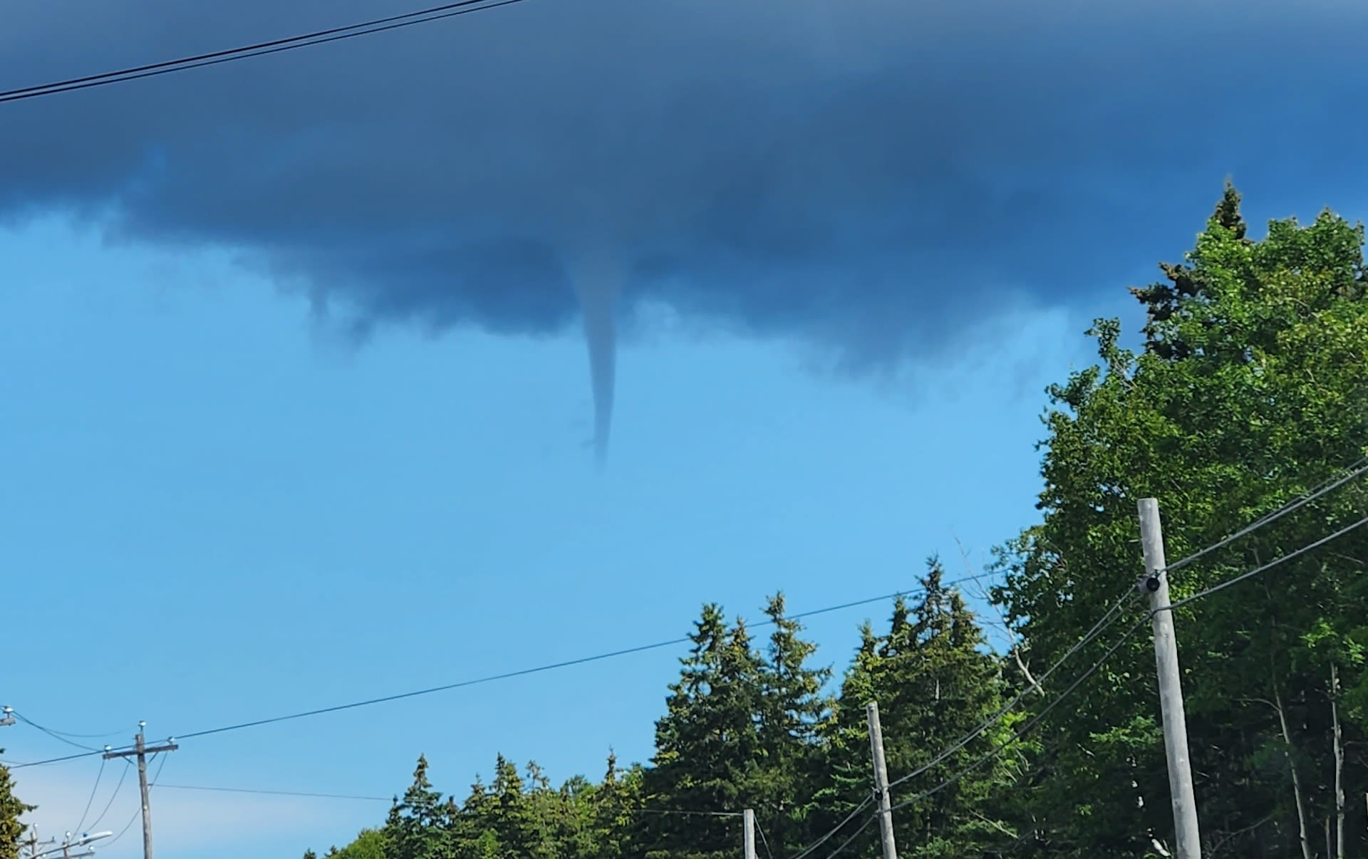 Sprawling storm plasters Prairies with rain, funnel cloud risk - The ...