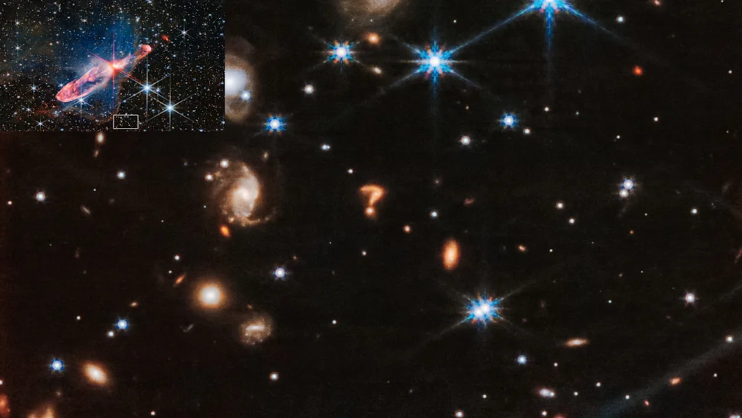 Webb Spots A Cosmic Question Mark While Peering At Rambunctious Young