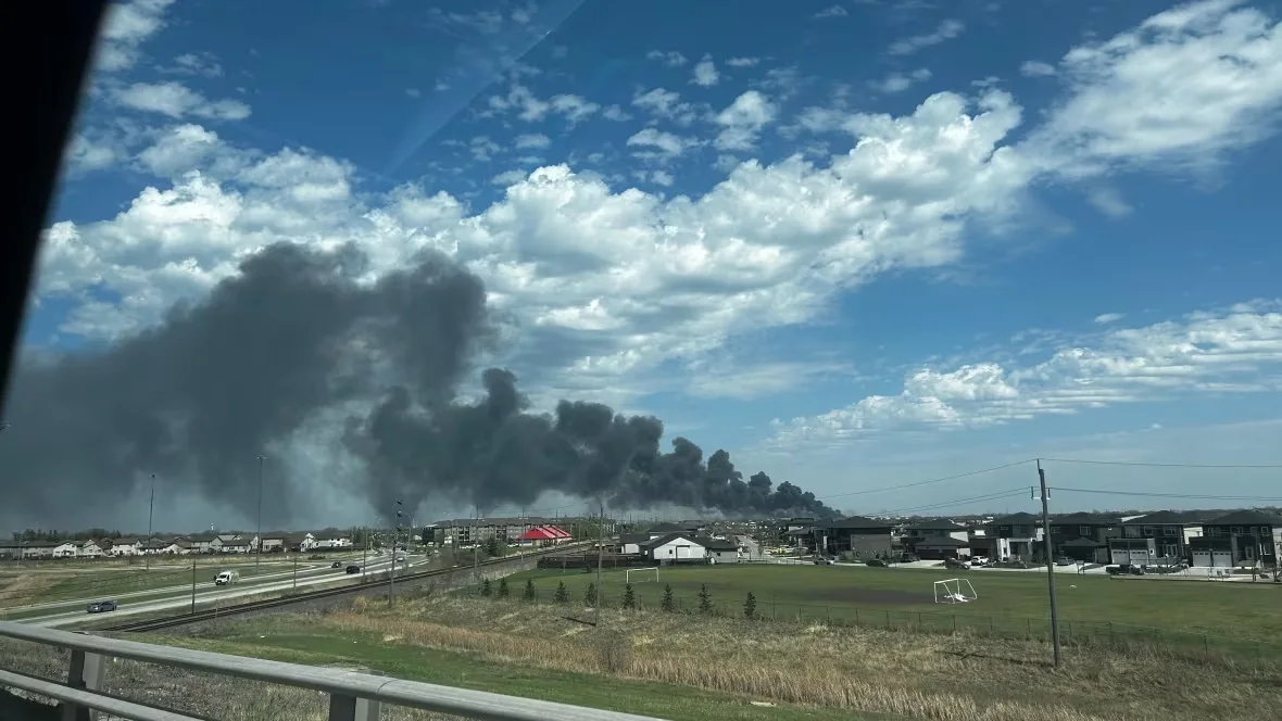 Large grass fire threatens homes and businesses in Winnipeg's Transcona ...