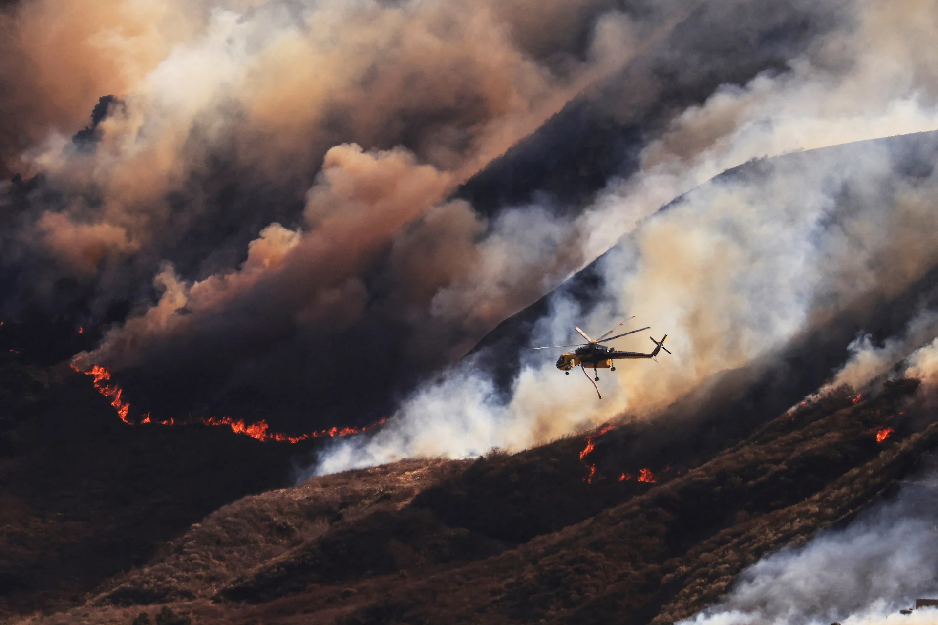 Firefighters gaining control over devastating wildfire near Los Angeles ...