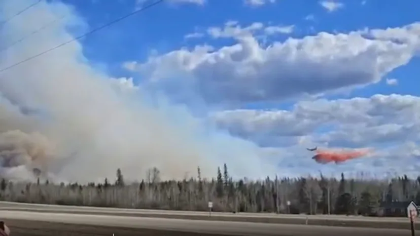 'Raining down ash': Fast-moving wildfire continues to rage near ...