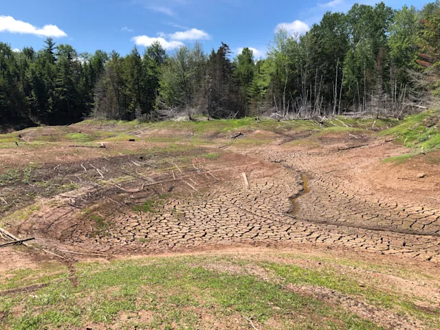Drained Nova Scotia lake exposes potential hidden cave - The Weather ...