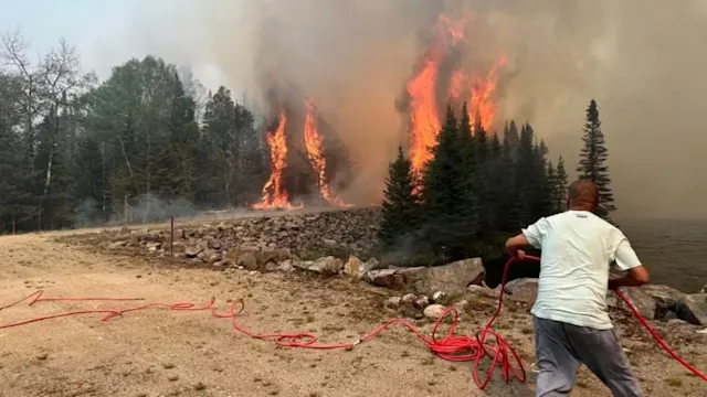Quebec fire crews get boost with hundreds of reinforcements arriving ...