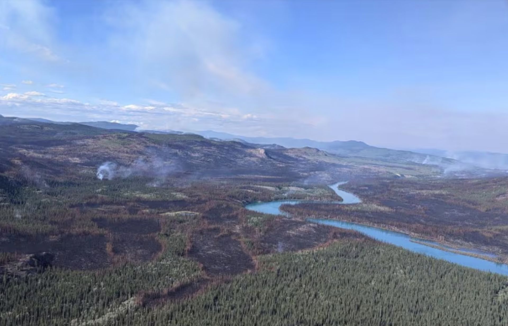Wildfire creates smoky conditions on Yukon River north of Whitehorse ...