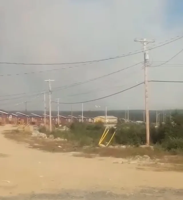 Shift in winds blows raging wildfire closer to Marcel Colomb First ...