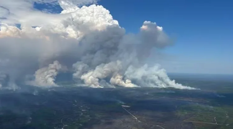 Prairie wildfire threat remains high as heat peaks and storms roll in ...