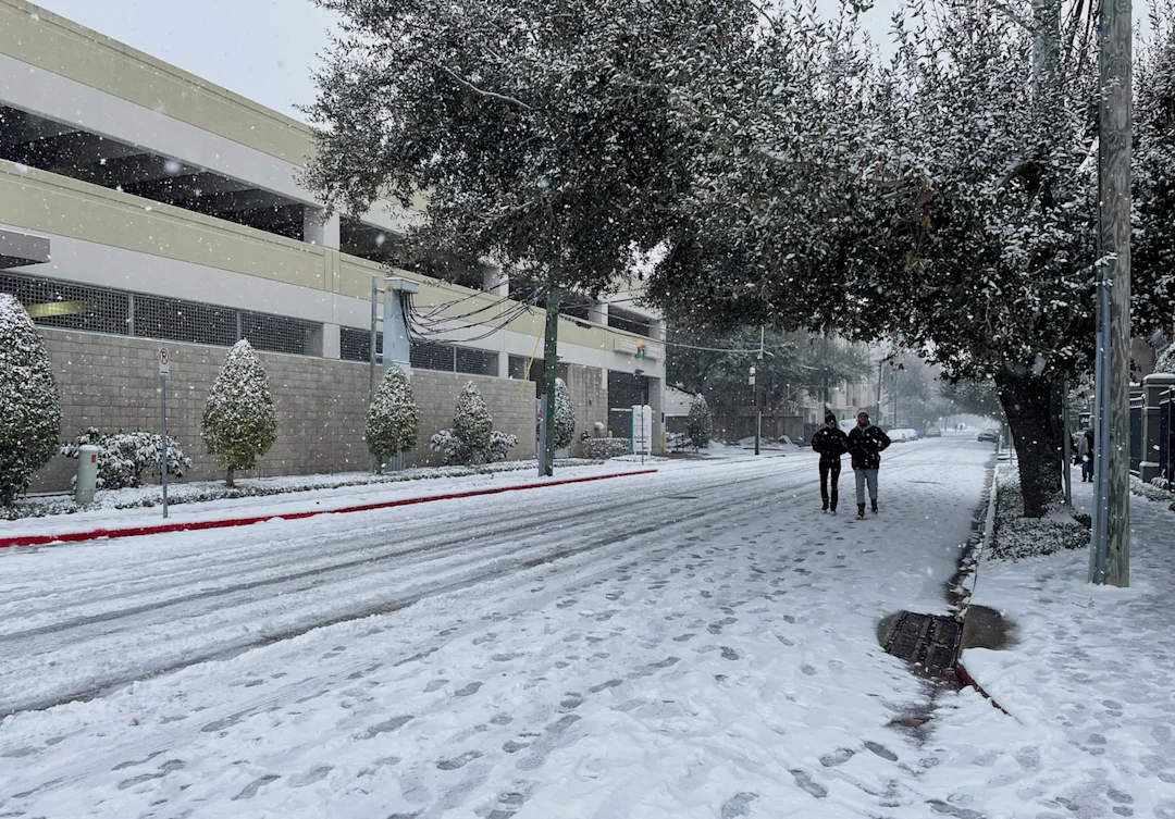 Rare snowstorm blankets Houston and New Orleans in white - The Weather ...