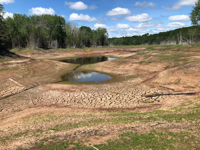 Drained Nova Scotia lake exposes potential hidden cave - The Weather ...