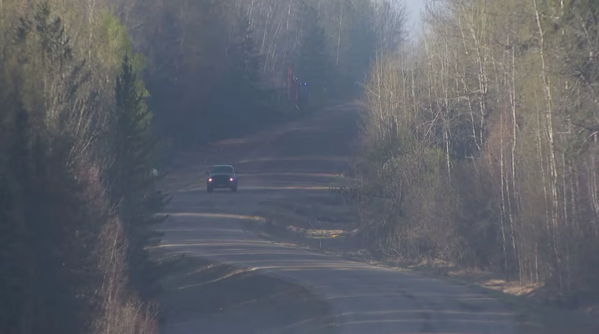 'Raining down ash': Fast-moving wildfire continues to rage near ...
