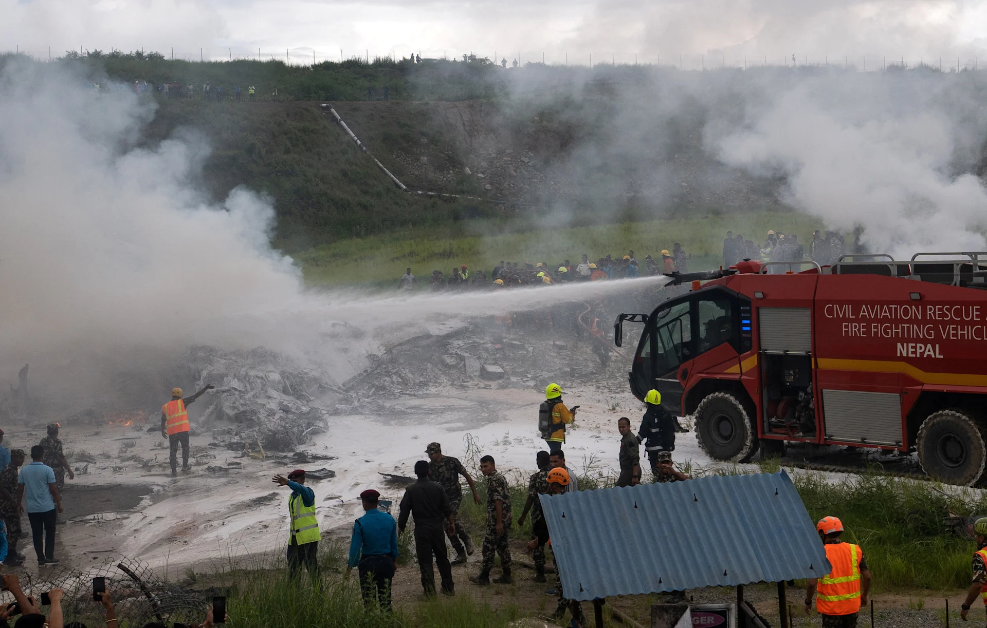 Plane crash at Nepal's Kathmandu airport kills 18, pilot sole survivor ...